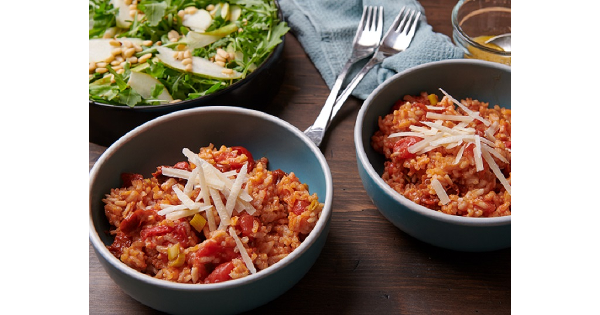 Cherry tomato risotto with rocket and pear - Coeliac UK